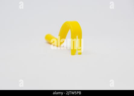 object known as a tick remover, used to remove ticks from people's ...