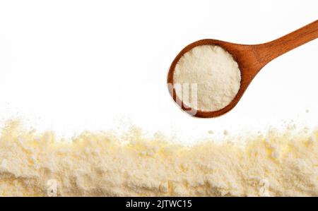 Powdered milk with nutrients in the wooden spoon Stock Photo - Alamy