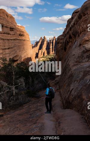 Female Hiker on Slick Rock at The New Wave Formation, Glen Canyon ...