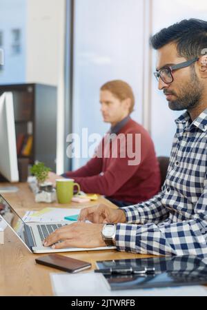 Young businessman employee and a lot of work in the office Stock Photo ...