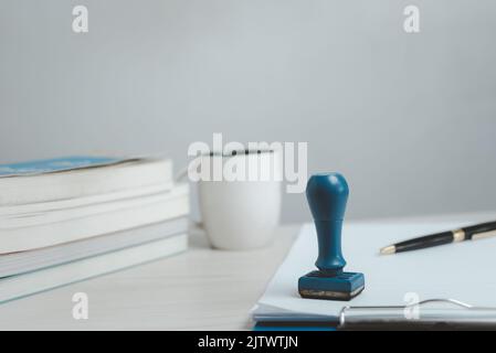 Business stamping approved on documents working in the office Stock ...