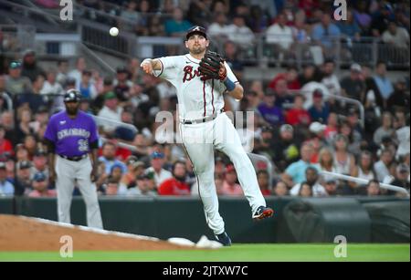 Atlanta Braves third baseman Austin Riley fields a single by ...