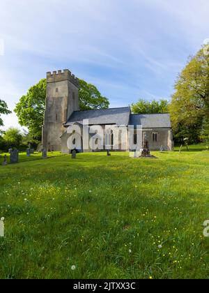 Churchyard of St Mary Magdalene parish church built in 13th century ...