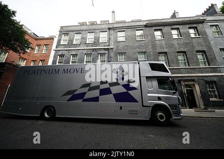 A removal van sits outside 10 Downing Street in London in Boris Johnson ...