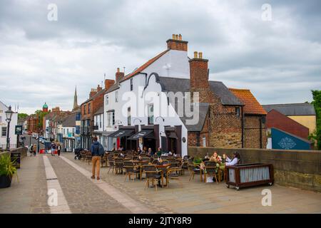 Historic commercial buildings on Elvet Bridge Street in historic city ...