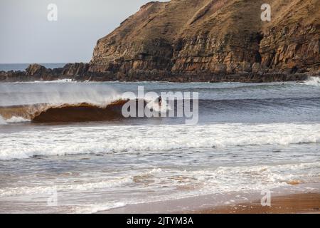 Surfing at Melvich Bay Sutherland along the North Coast 500 Stock Photo ...