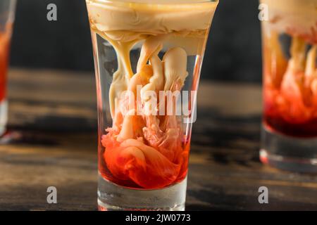 Boozy Halloween Brain Hemorrhage Shot Cocktail with Peach and Grenadine ...