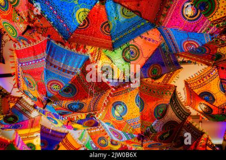 Red cloth hanging from ceiling. Thread brush. Interior decoration ...