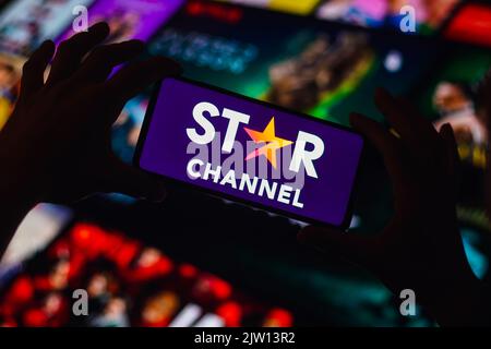 In this photo illustration a Star Channel logo seen displayed Stock ...