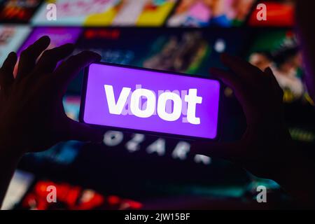 In this photo illustration, the Voot logo is displayed on a smartphone ...