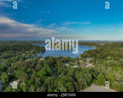 Late afternoon aerial photo of Lake Mahopac located in Town of Carmel ...