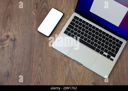 Computer splash screen and blank phone screen Stock Photo - Alamy