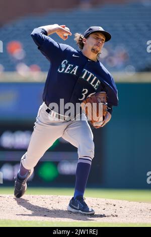 Seattle Mariners starting pitcher Logan Gilbert sits in the dugout ...
