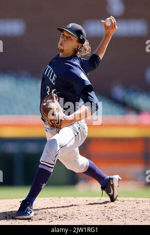 Seattle Mariners starting pitcher Logan Gilbert sits in the dugout ...