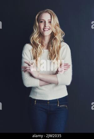 A beautiful blonde woman exudes confidence wearing stylish denim ...