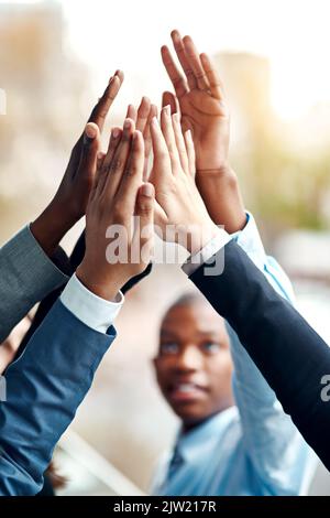 closeup shot of business people hands using pen while taking notes on ...