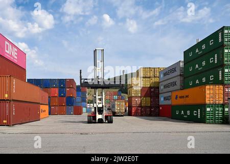Container stacker Freight container Stock Photo - Alamy