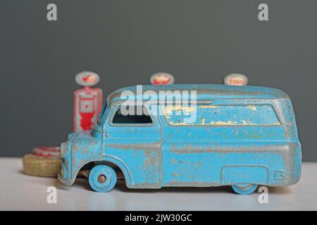 Rusty old toy van and petrol pumps Stock Photo - Alamy