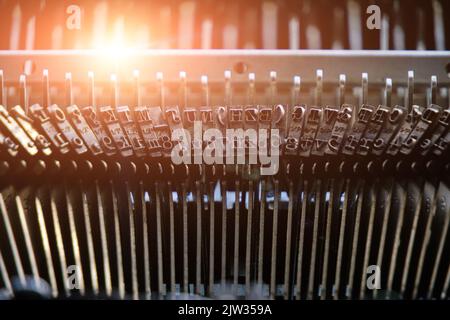 Mechanical hammers with alphabet for typing old typewriter Stock Photo ...