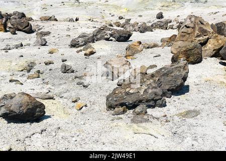 volcanic bomb among the tephra on the slope of the volcano close-up ...