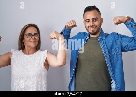 Mother and son smiling confident training yoga at sport center Stock ...