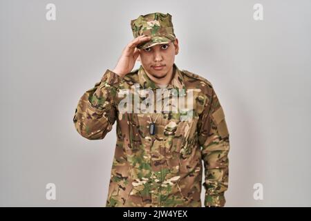 Young arab man wearing camouflage army uniform smiling positive doing ...