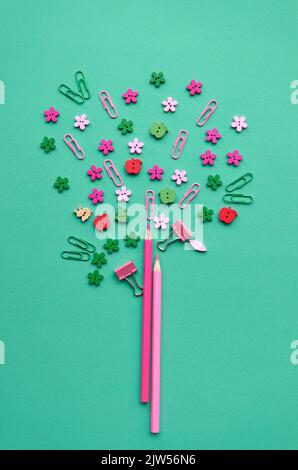 School supplies on green background Stock Photo - Alamy