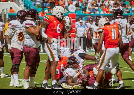 Miami linebacker Corey Flagg Jr. (11) prepares to tackle Clemson ...