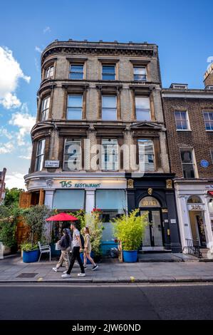 TAS Restaurant on Bloomsbury Street, London Stock Photo - Alamy