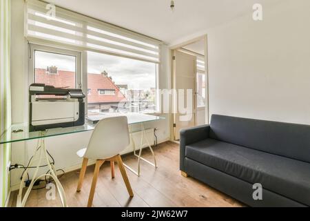 Modern office printer placed in a professional workspace. The image ...