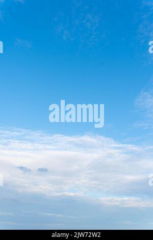 White cumulus clouds on clear blue sky background closeup, overcast ...