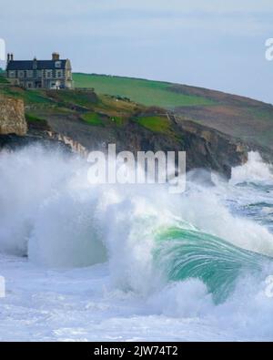 Porthleven beach awash with waves of all sizes Stock Photo - Alamy