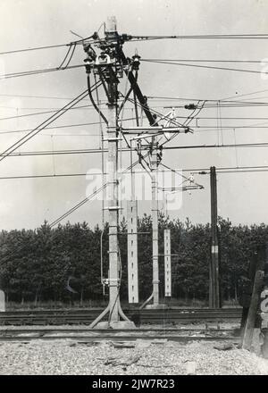 Image of an overhead pipe portal with switches on the railway line in ...