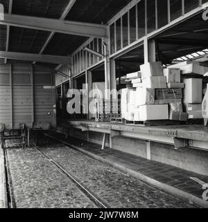 Interior of the goods shed by the N.S. in Utrecht, while loading a ...