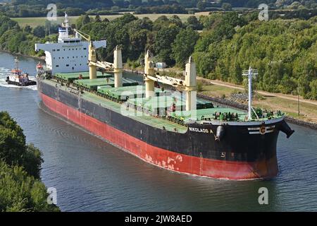 Bulk Carrier NIKOLAOS A passing the Kiel Canal Stock Photo - Alamy