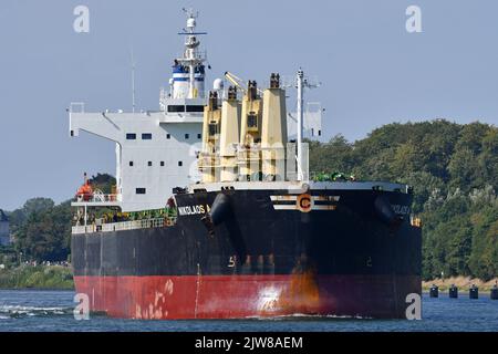 Bulk Carrier NIKOLAOS A passing the Kiel Canal Stock Photo - Alamy