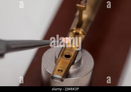 Transmission electron microscope sample holder been loaded with an ...