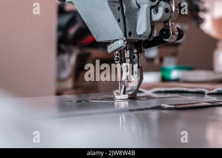 Sewing machine needles close-up in the workshop Stock Photo - Alamy