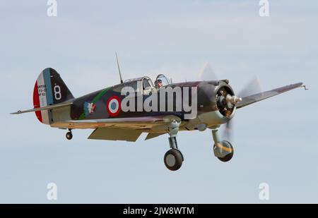 Curtis H-75A-1 of the Fighter company landing on runway 24 at the ...