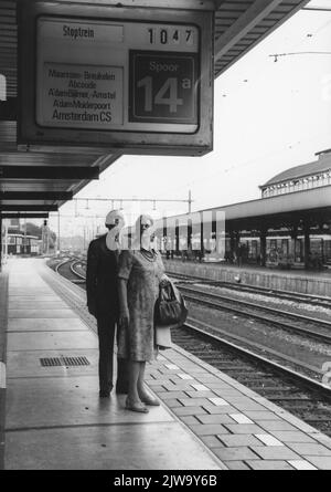 UTRECHT - Waiting travelers at Utrecht Central Station during the ...