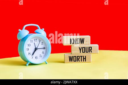 Know Your Worth on wooden blocks. Self motivation coaching HR concept ...