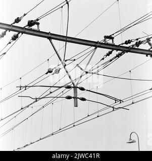 A railroad overhead power line component along a track with a rail ...