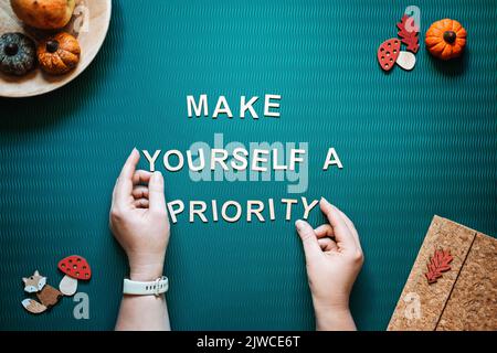 Self-care quotes, make yourself a priority words on green background ...