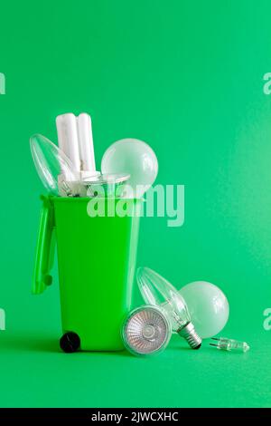 Stop energy waste concept: diverse old halogen and fluorescent light ...
