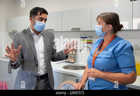 Humza usaf talks with registered Nurse Laura Hastings at Victoria Manor ...