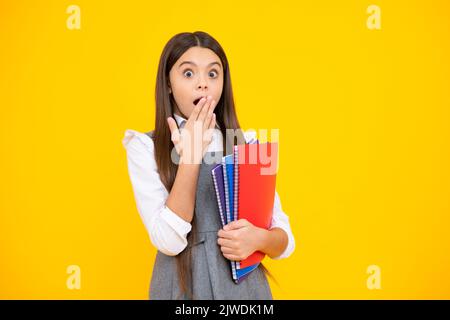 Surprised emotions of young teenager school girl. Schoolchild, teenage ...