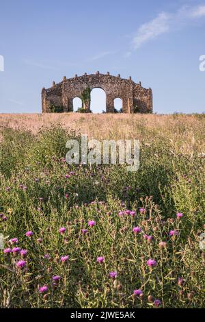 The Rouseham Eyecatcher folly ( faux ruin ) in the middle of a field in ...