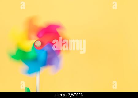 Moving coloured pinwheel on yellow background. Thematic lgtbq Stock ...