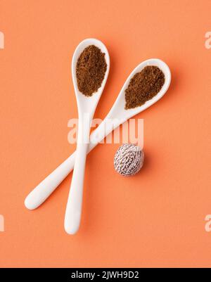 Organic nutmeg powder in two spoons - Myristica Stock Photo - Alamy