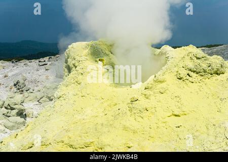 cone of sulfur deposits around a fumarole in a solfataric field Stock ...